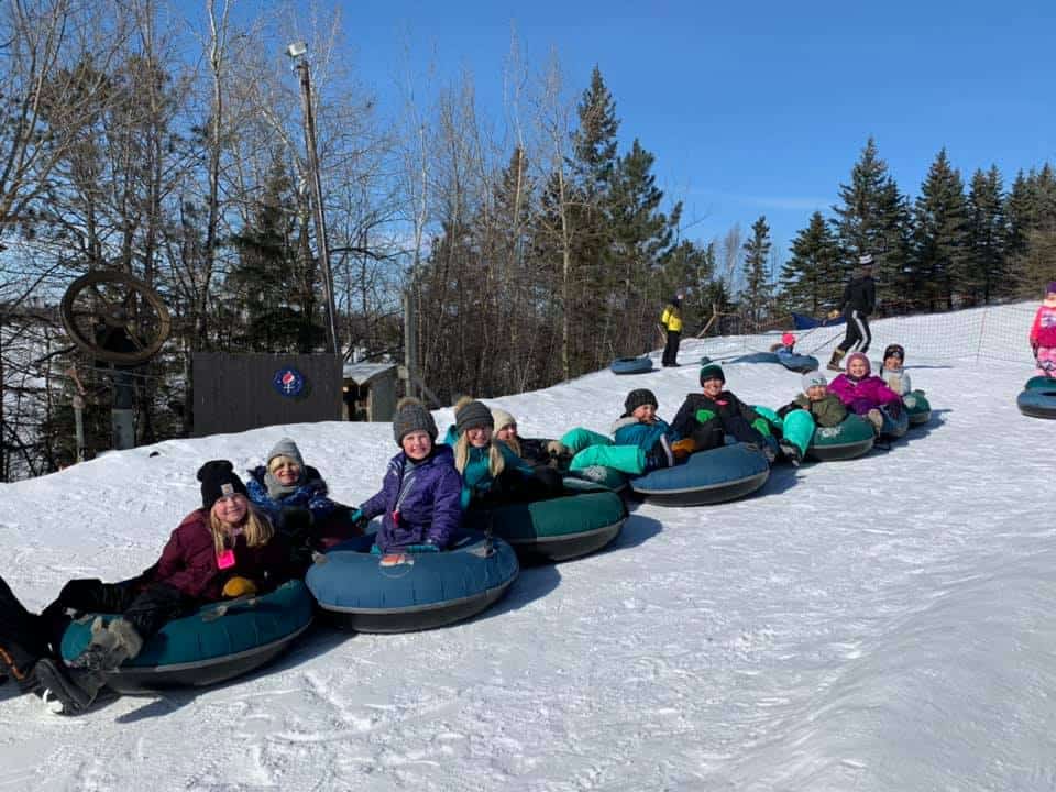 Best Snow Tubing Hills In Minnesota for Winter 2021: Tow Rope Included!